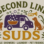 Second Line Suds: Dignity on the Move - Ulule